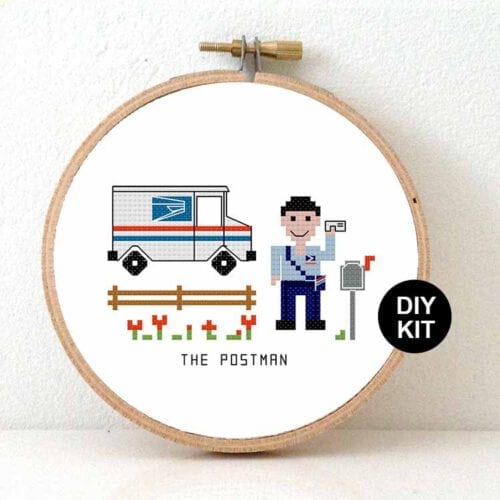 Male postman cross stitch kit | Studio Koekoek