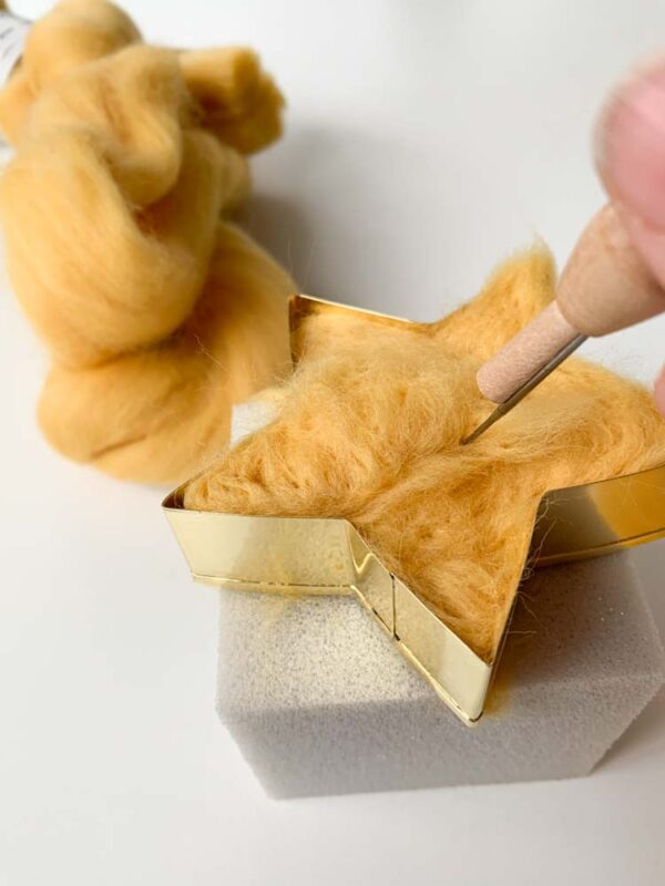 How to needle felt a star from wool roving with a cookie cutter ...